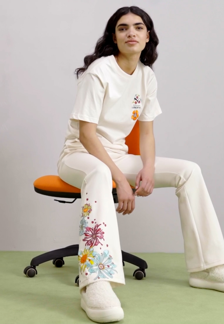 Puma LIBERTY FLARED PANTS - Tracksuit bottoms - pristine/beige - Zalando.co.uk